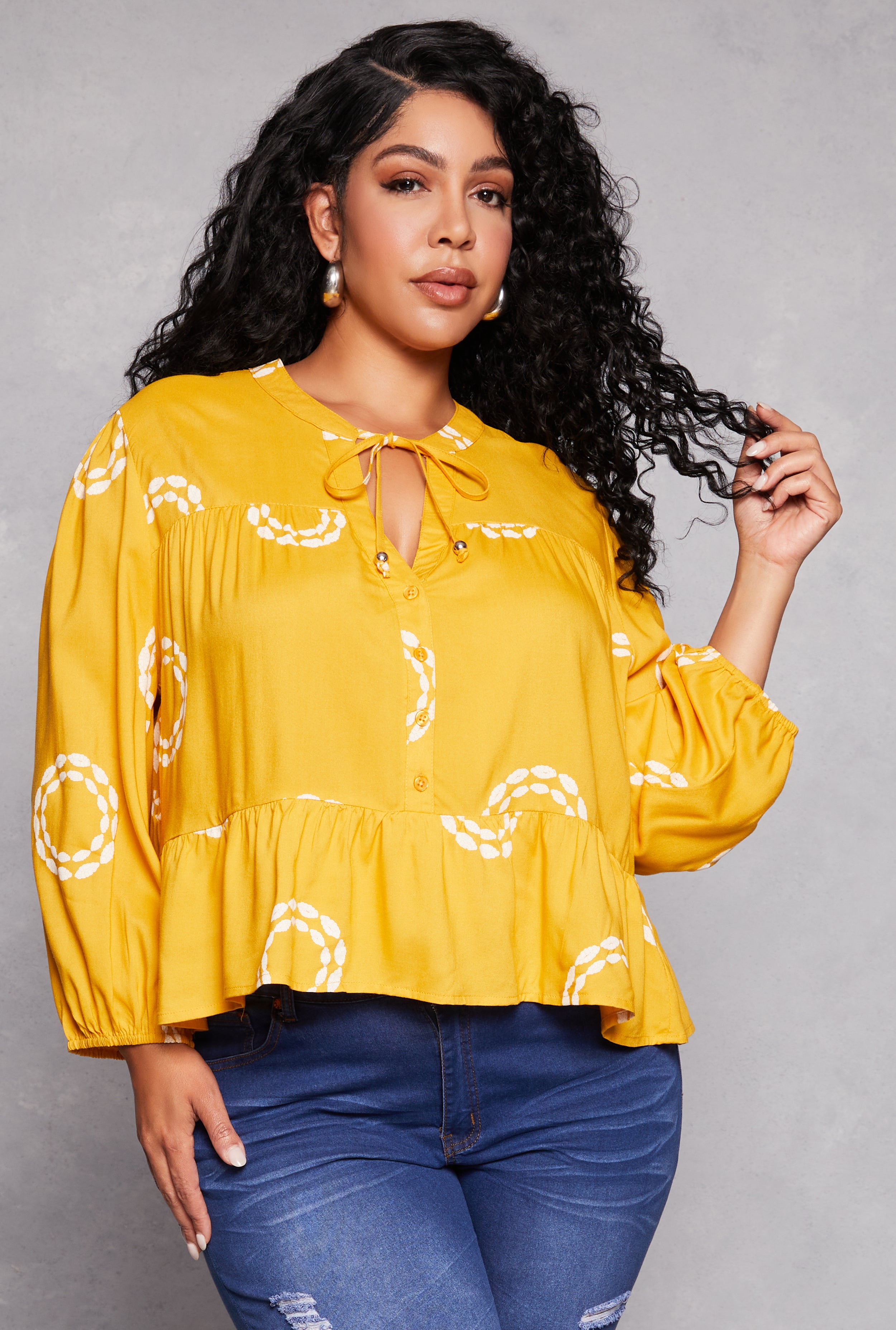 Plus Size Printed Puff Sleeve Button Front Peplum Blouse
